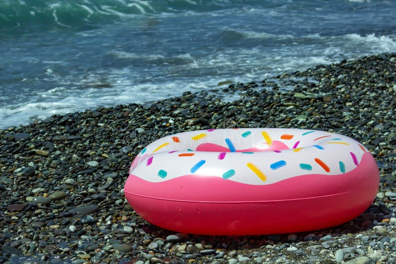 Hipster Sprinkled Doughnut Float in Sea Waves. Summer Background Stock ...