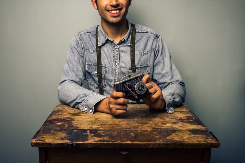 Hipster with Vintage Camera at Old Desk Stock Image - Image of ...