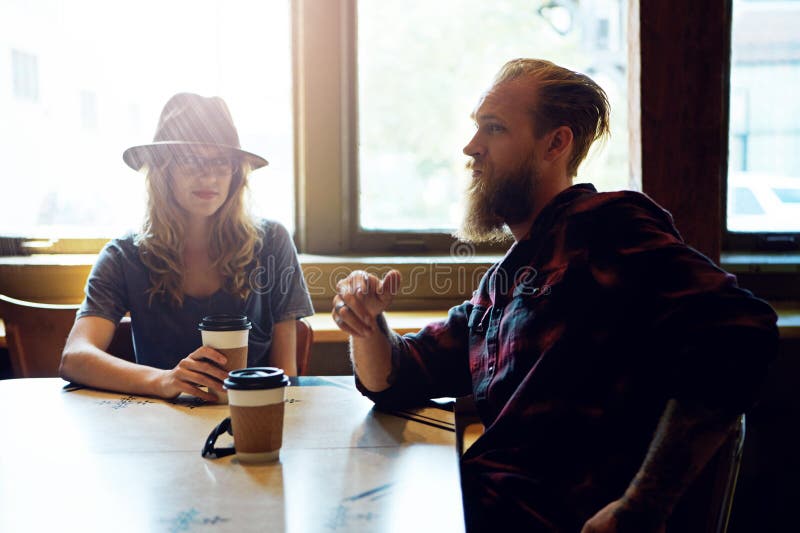 Hipsters at the Coffee Shop. a Hipster Couple in a Coffee Shop. Stock Image - Image of beard ...