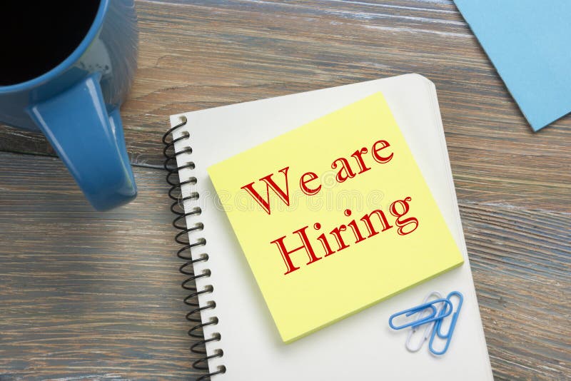 We are Hiring. Office Desk Table with Notepad, Reminder and Coffee Cup ...