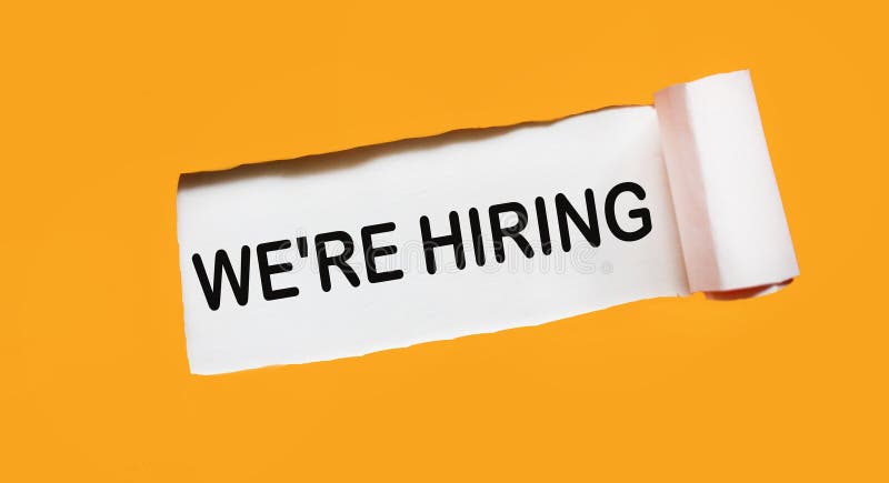 We are Hiring Written Under Torn Yellow Paper. Human Resources Concept ...