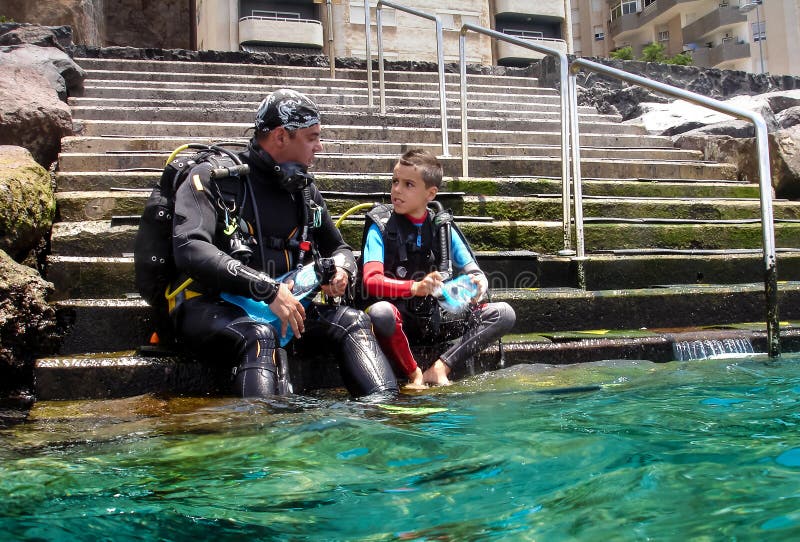 His first dive stock photo. Image of water, instructor - 56203336