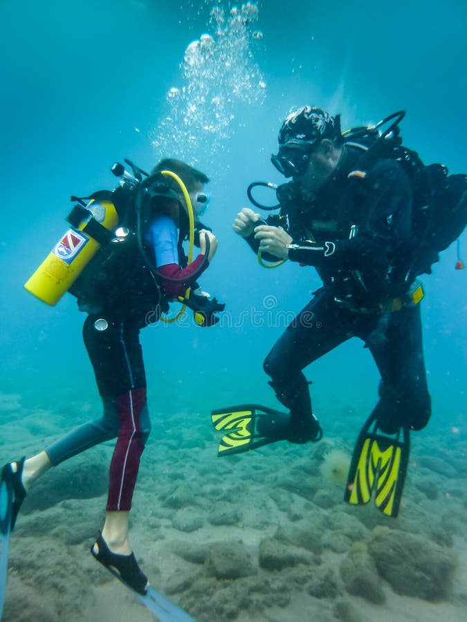His first dive III stock image. Image of father, child - 56203891