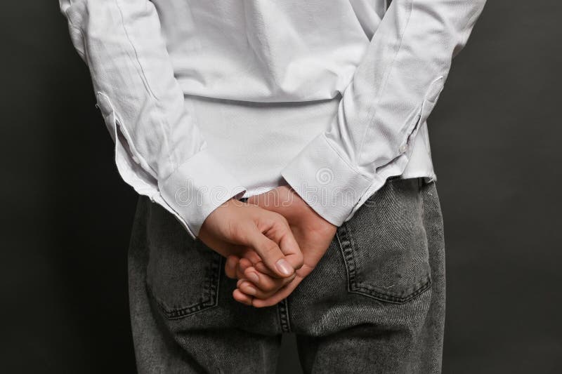 His Hands are Folded Behind His Back. Stock Image - Image of back, body ...