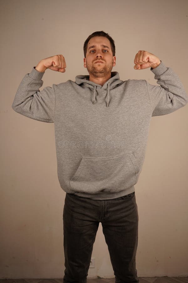 His Pose Emphasizes His Physical Strength and Confidence. this Gesture ...