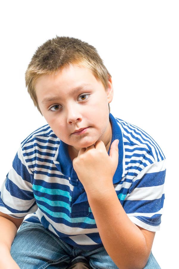Hispanic-American Child Rests Chin on Hand during Picture Stock Photo ...