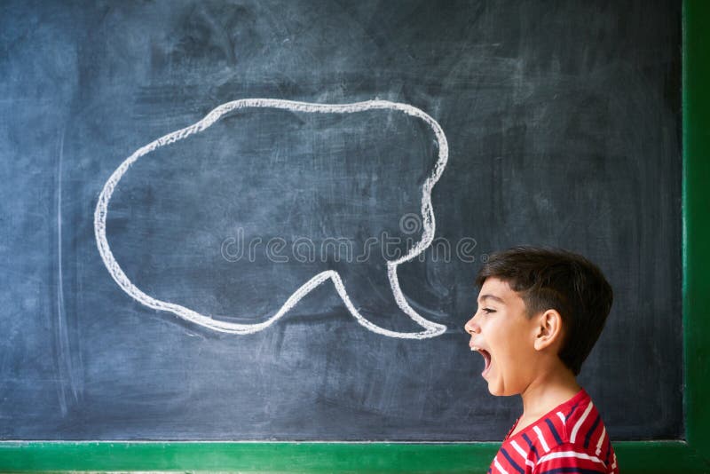 Hispanic Boy Screaming in Classroom with Cloud on Blackboard Stock ...