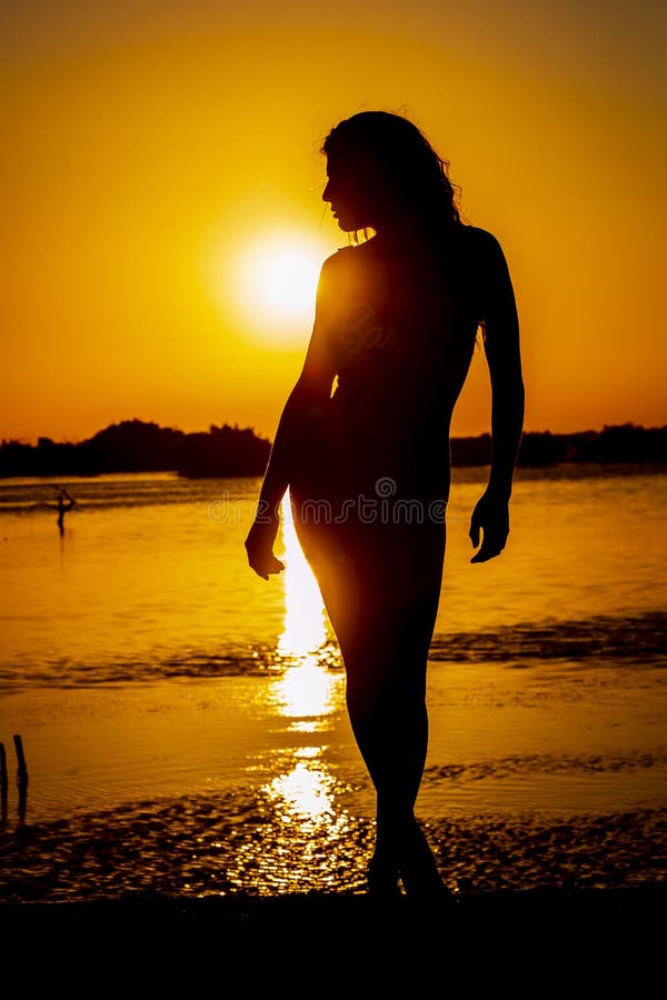 Hispanic Brunette Model Enjoying an Early Morning Sunrise Stock Photo ... Hispanic Brunette Model Enjoying an Early Morning Sunrise Stock Photo ...