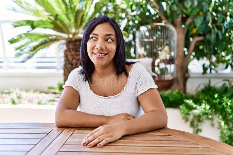 Hispanic Brunette Woman Sitting at the Terrace Stock Image - Image of ...