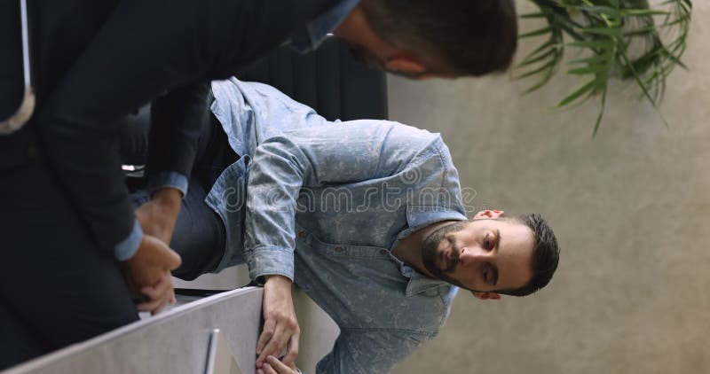 Hispanic Business Man Having Formal Conversation with Client Stock ... Hispanic Business Man Having Formal Conversation with Client Stock ...