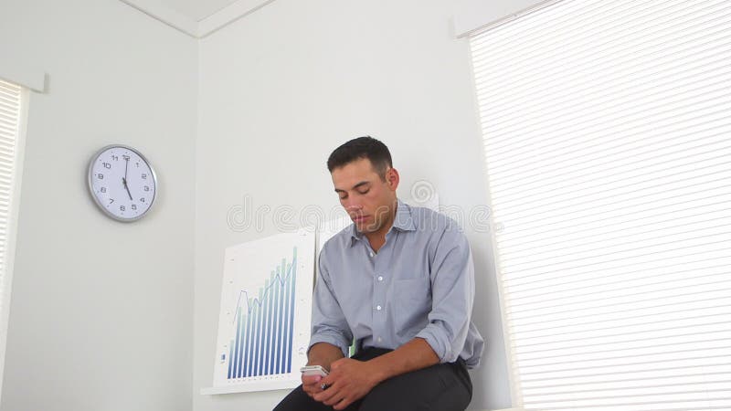 Hispanic Business Man Texting in Office Stock Footage - Video of ...