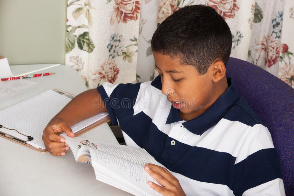 Hispanic Child Reading stock photo. Image of young, studying - 34377660