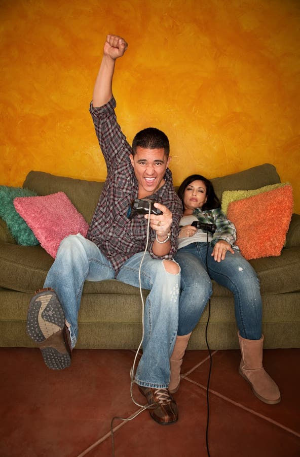 Hispanic Couple Playing Video Game Stock Photo - Image of hispanic ...