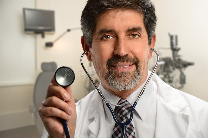 Hispanic Doctor Using Stethoscope Stock Photo - Image of uniform ...