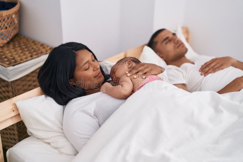 Hispanic Family Lying on Bed at Bedroom Stock Photo - Image of together ...