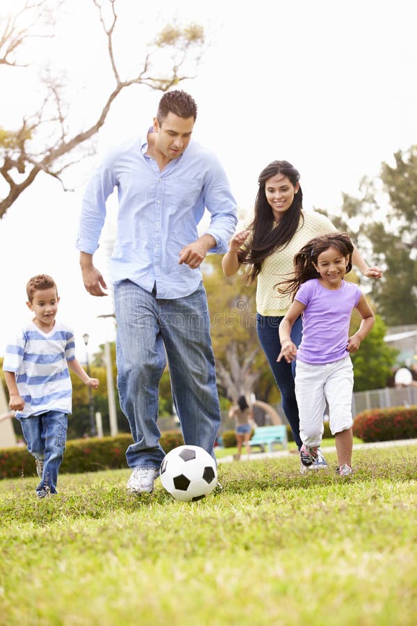 Hispanic Family Playing Soccer Together Stock Photo - Image of happy ...