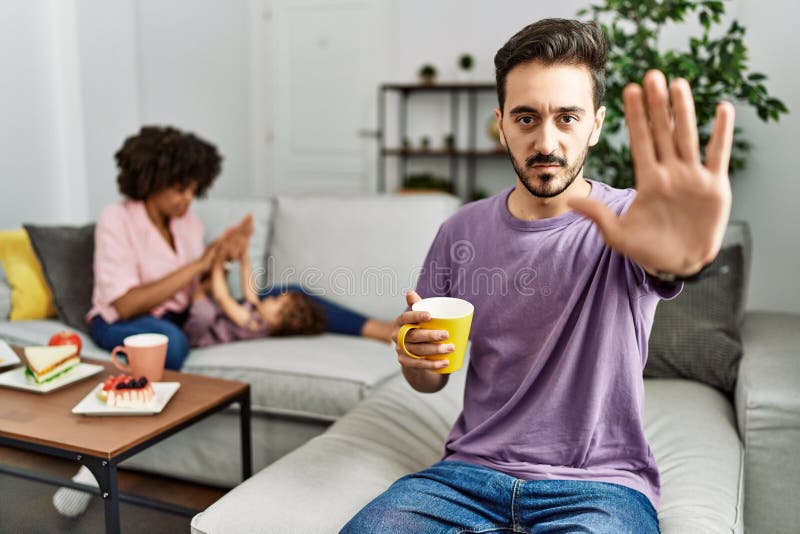 Hispanic Father of Interracial Family Drinking a Cup Coffee Doing Stop ...