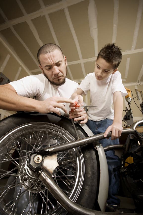 Hispanic Father and Son in Garage Stock Image - Image of hispanic ...