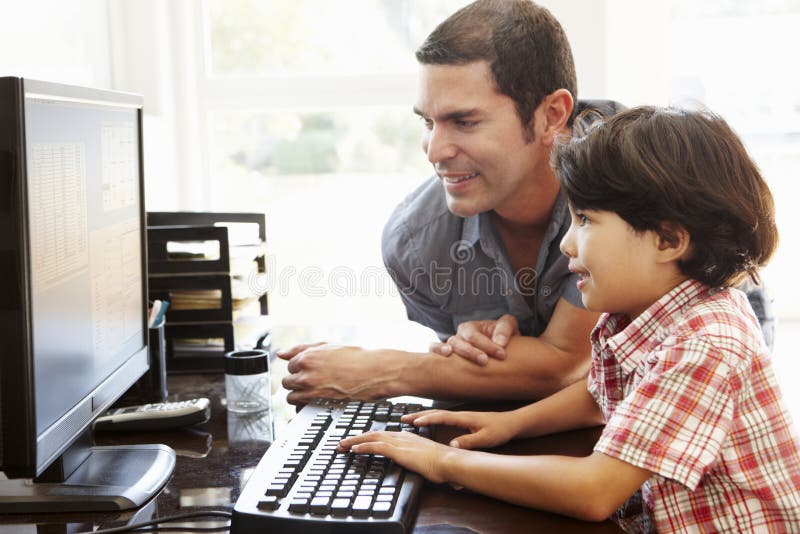Hispanic Father with Baby Working in Home Office Stock Image - Image of ...