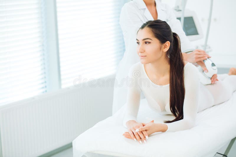 Beautiful Brunette Woman Getting Lpg Massage For Lifting Body In Lpg