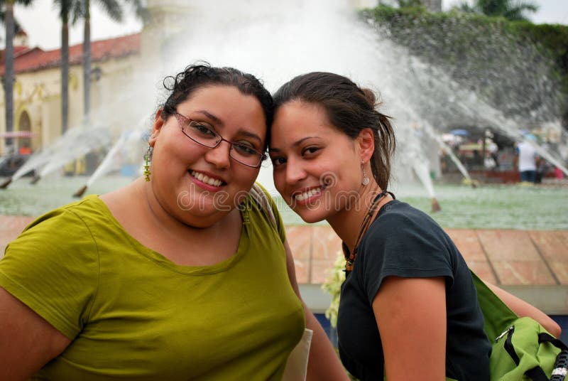 Hispanic friends talking stock photo. Image of friendship - 9197720