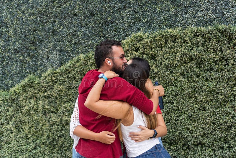 Hispanic Friends Greet Each Other at a Party Stock Photo - Image of ...