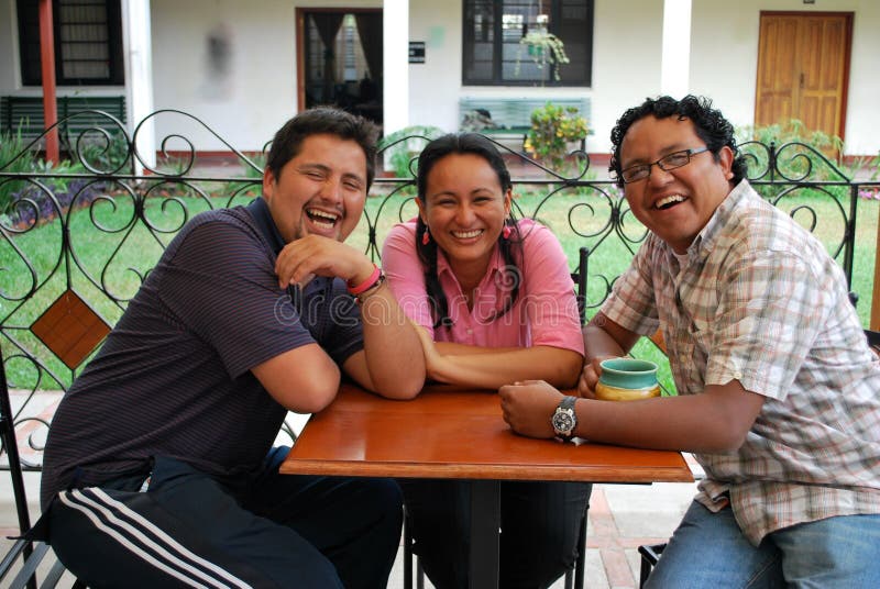 Hispanic Friends Laughing Together Stock Image - Image of outdoors ...