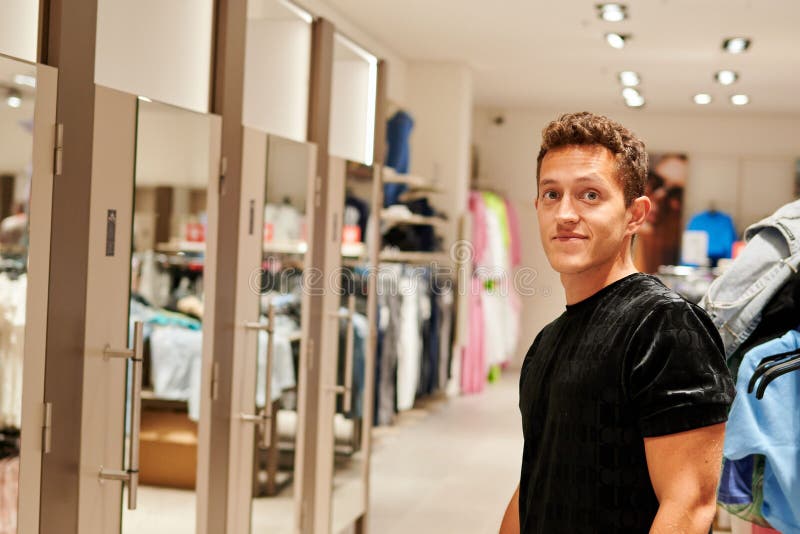Hispanic Happy Man Posing in a Clothing Store Stock Photo - Image of ...