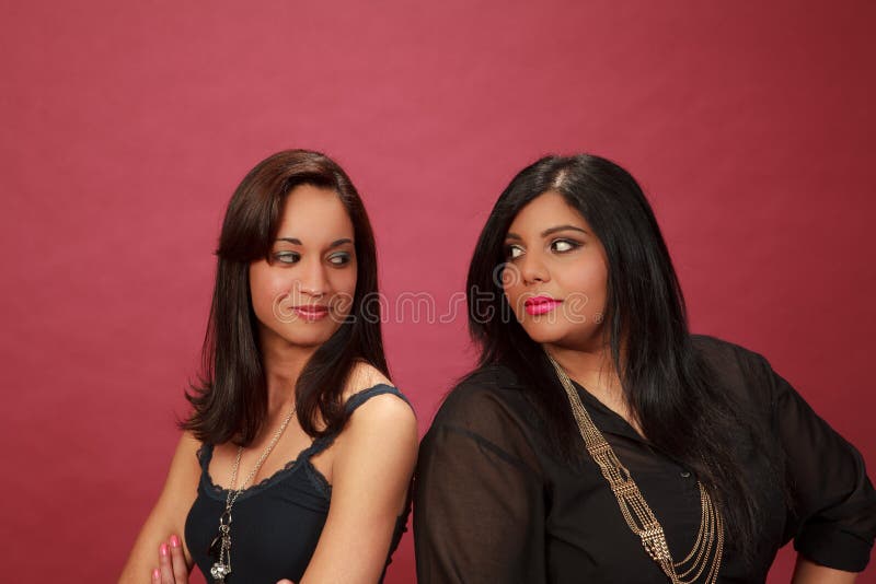 Hispanic and Indian Girl Smirking Stock Photo - Image of garment, humen ...