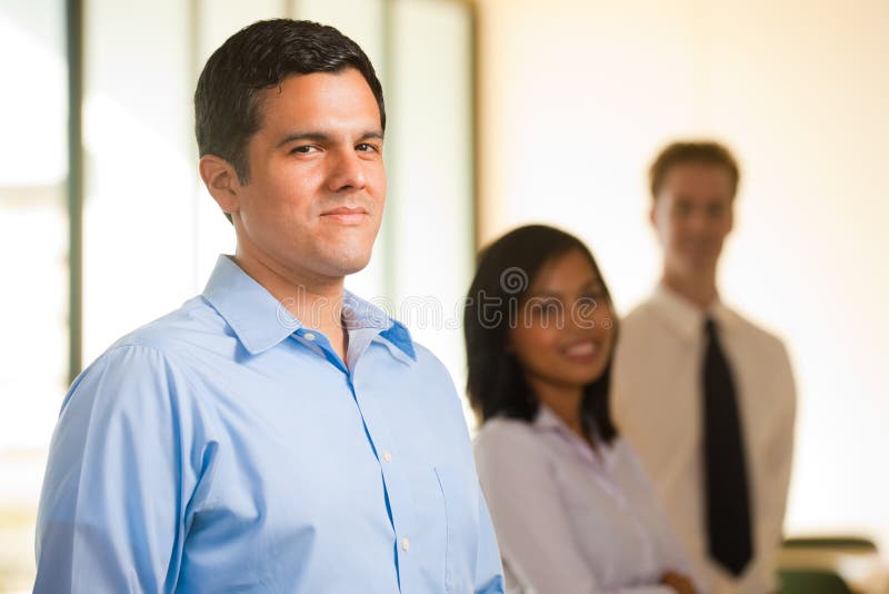Hispanic Male Team Leader Row Stock Photo - Image of foreground, focus ...