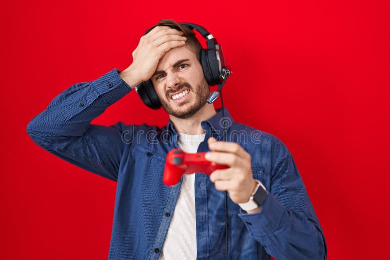 Hispanic Man with Beard Playing Video Game Holding Controller Stressed ...