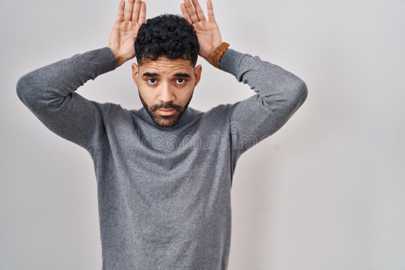 Hispanic Man with Beard Standing Over White Background Doing Bunny Ears ...