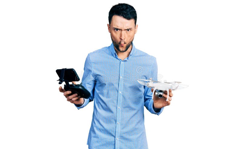 Hispanic Man with Beard Using Drone with Remote Control Making Fish ...