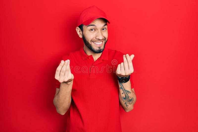 Hispanic Man With Beard Wearing Delivery Uniform And Cap Doing Money
