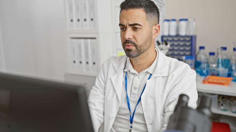 Hispanic Man with Beard in White Lab Coat Working in a Hospital Laboratory Setting Stock Photo ...