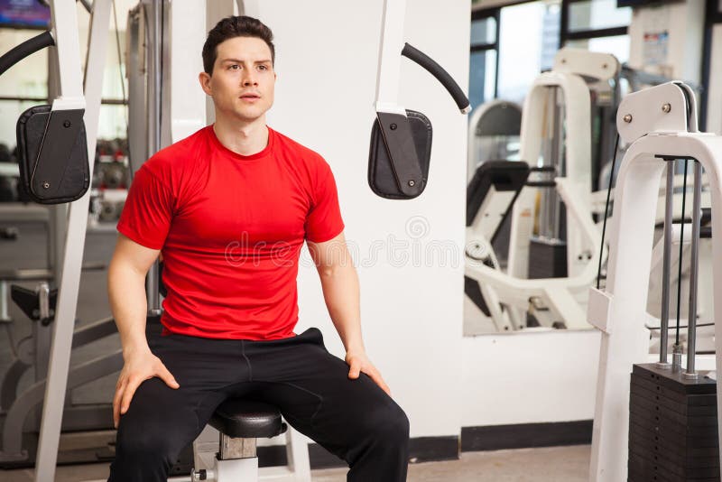 Working Out on Pec Deck Machine Stock Photo - Image of exercising ...