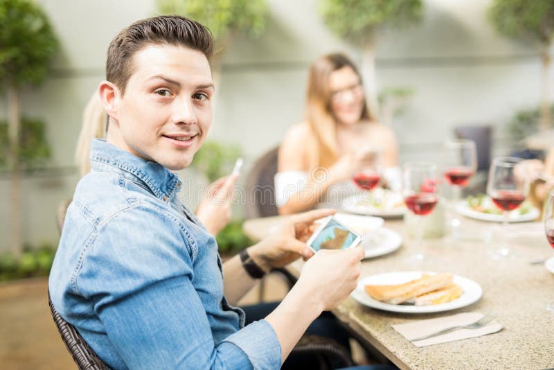 Hispanic Man Taking A Picture Of His Food Stock Image Image Of Casual