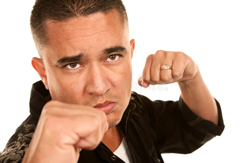 Hispanic Man Throwing Punch Stock Image - Image of violent, latino ...