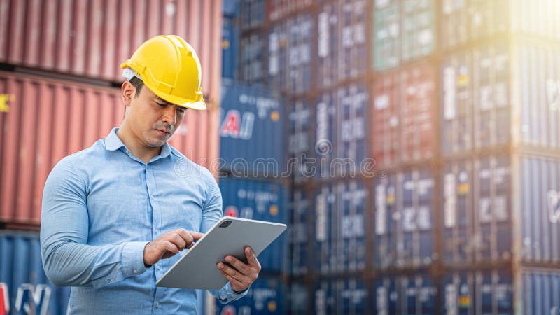 Hispanic Manager Checking on a Tablet at Shipping Container Yard. Stock ...