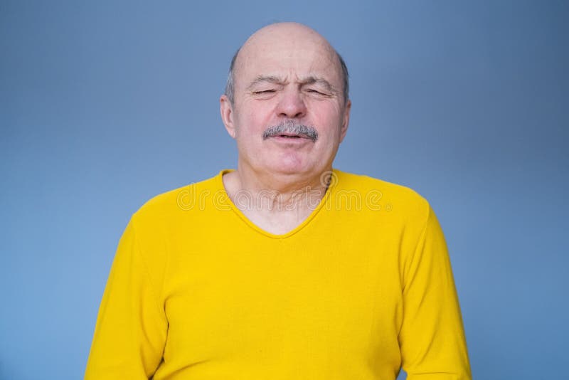 Hispanic Old Man with Pain, Isolated on Blue Wall Stock Image - Image ...