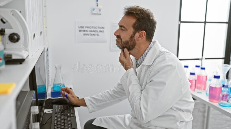 Hispanic Scientist Man with Beard Thinking in a Laboratory Indoor ...