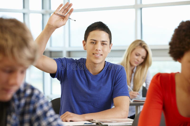 Hispanic Student Asking Question in Class Stock Image - Image of ...