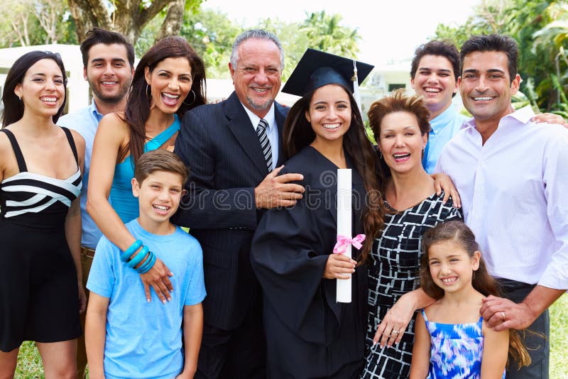 Hispanic Student and Parents Celebrate Graduation Stock Image - Image ...