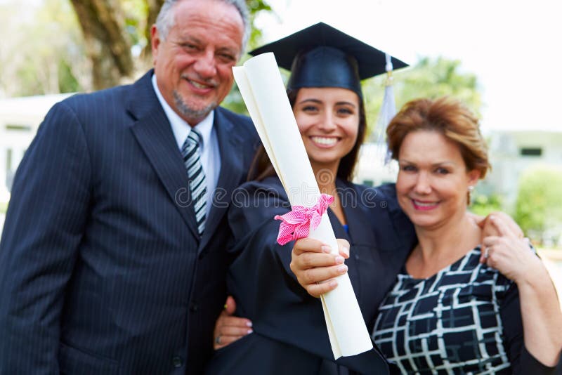 Hispanic Student and Family Celebrating Graduation Stock Photo - Image ...