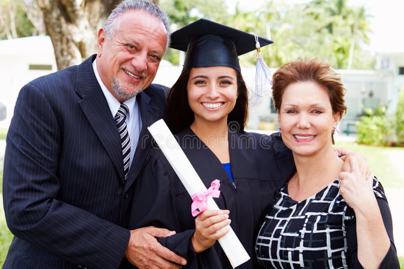 Hispanic Student and Parents Celebrate Graduation Stock Image - Image ...