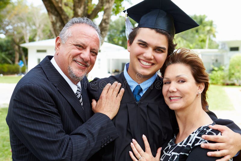 Hispanic Student and Parents Celebrate Graduation Stock Photo - Image ...