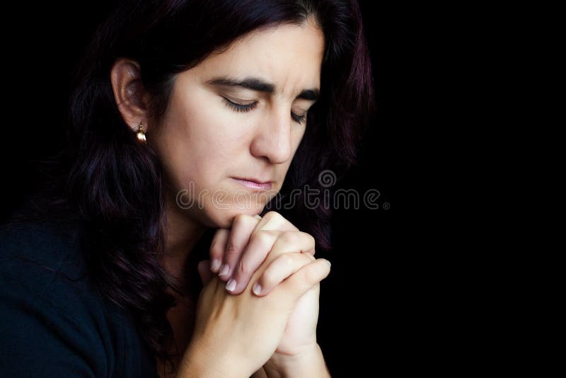 Hispanic Woman Praying Isolated on Black Stock Image - Image of adult ...