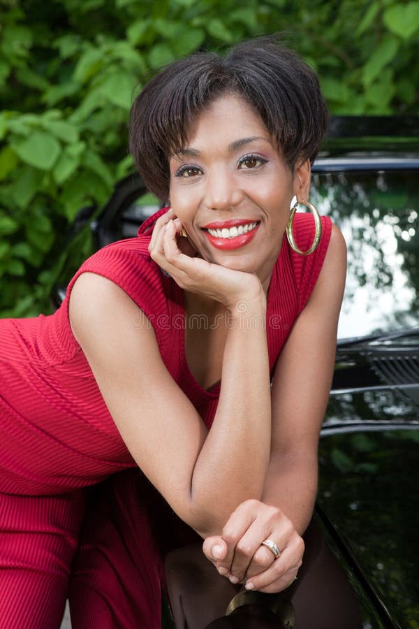 Hispanic Woman in Red Dress Stock Photo - Image of hispanic, side: 21945302