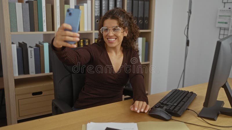 Hispanic Woman Taking Selfie in Office Workplace Showing Happy ...