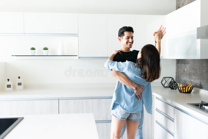 Romantic Couple Dancing in Kitchen Stock Image - Image of dancing ...